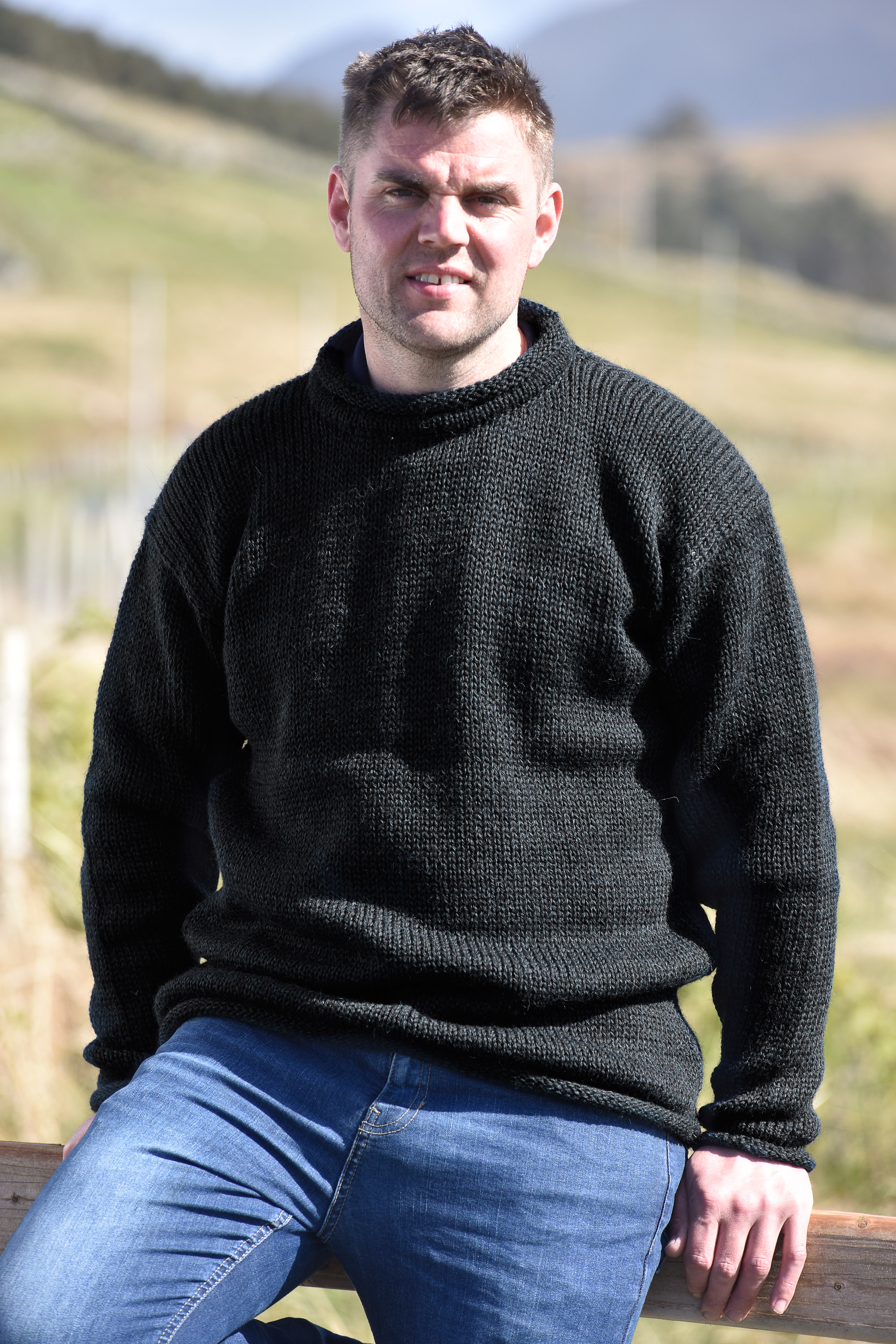 Donegal Roll Neck Sweater in solid black wool from Irish Inspiration ...