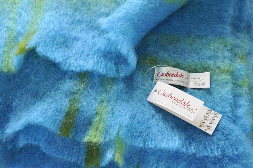 Buy a turquoise Cushendale woollen blanket throw from Irish Inspiration ...